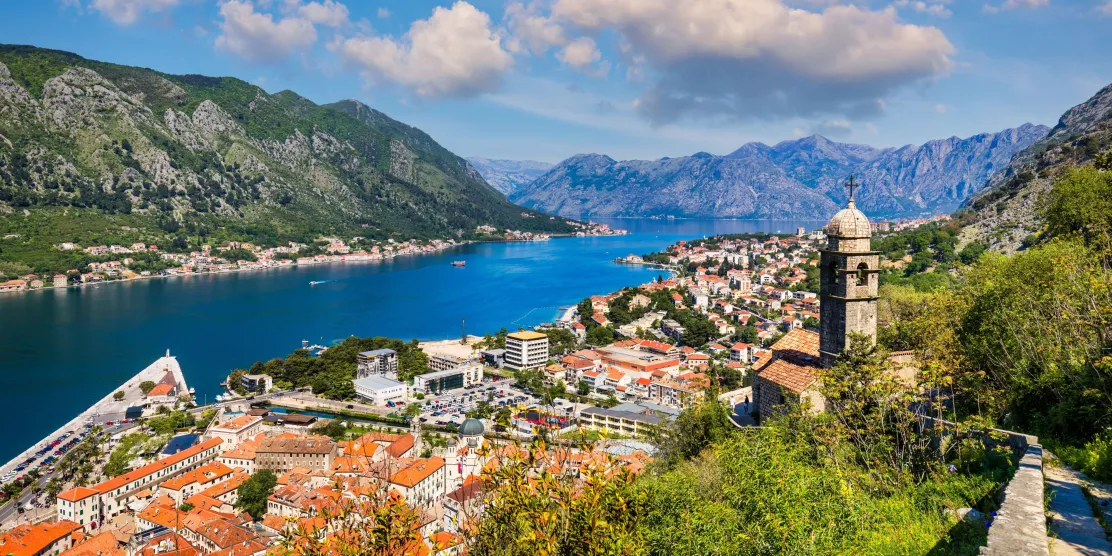 High-angle view of the Bay of Kotor and coastal town in Montenegro.