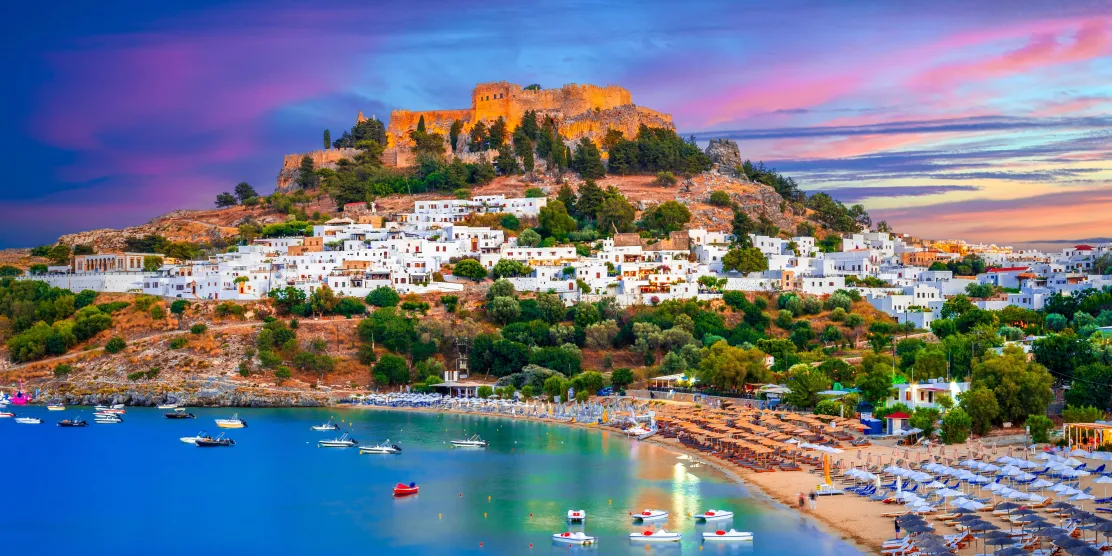 Historic Lindos acropolis fortress overlooking a coastal village in Greece