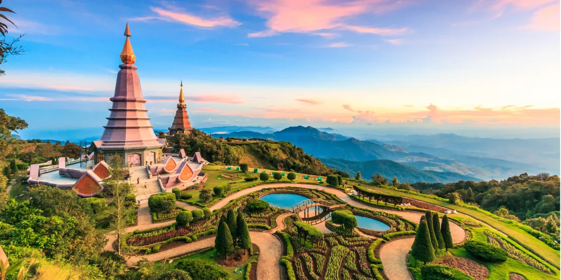 Landscape of two pagoda in Doi Inthanon Mountain with evening orange light