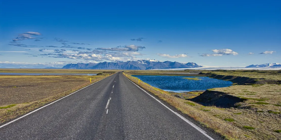 Iceland Ring Road trip route through a volcanic landscape with mountains and glaciers