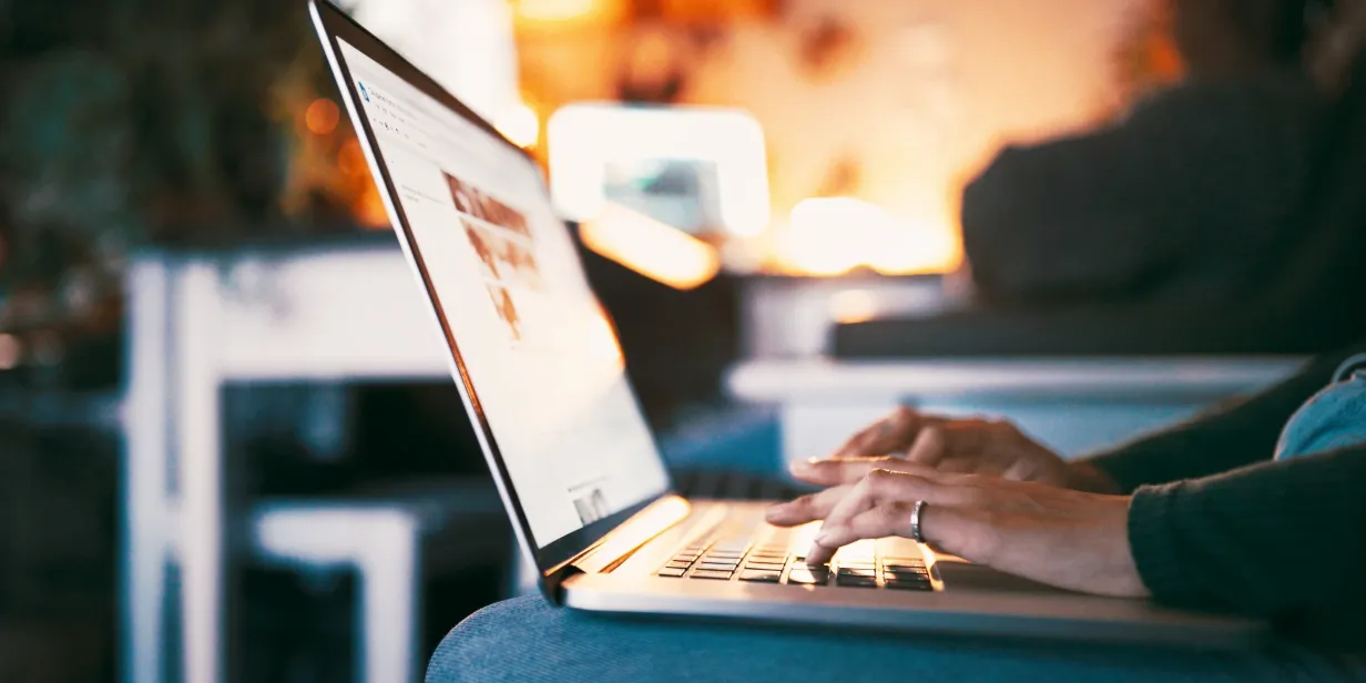 Woman on the laptop in the evening.